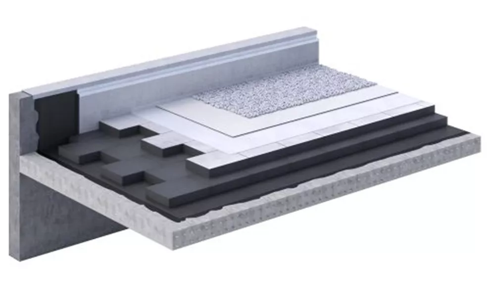Non-combustible inverted roof insulation with ballast finish